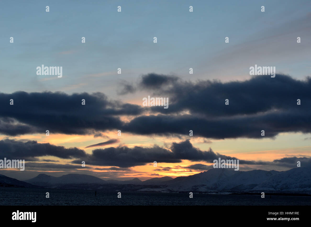 colorful dawn sky over snowy mountain Stock Photo - Alamy