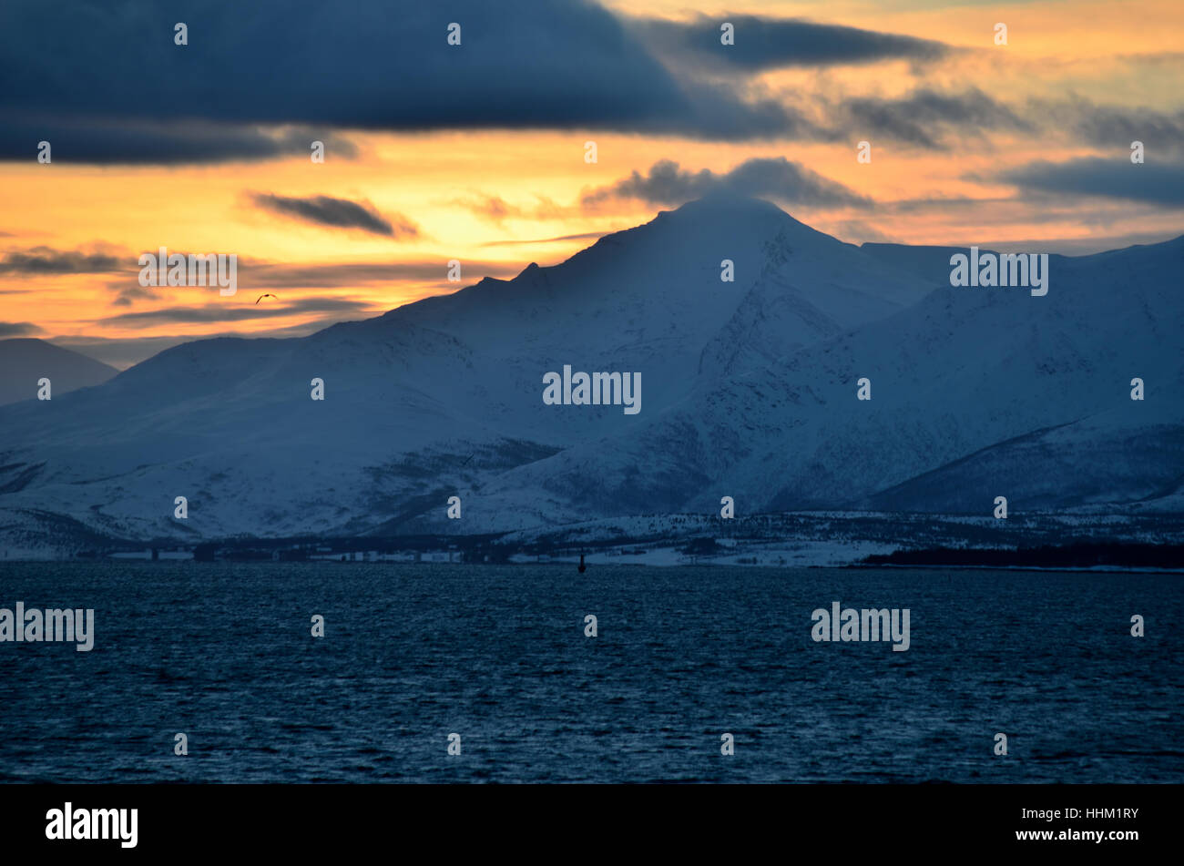 colorful dawn sky over snowy mountain and sea Stock Photo - Alamy