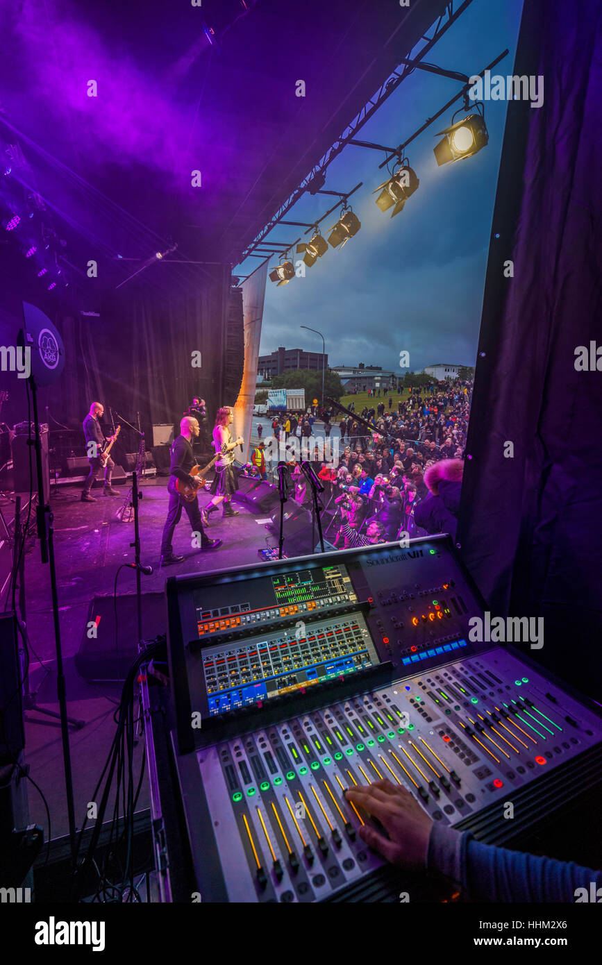 Soundboard and band on outdoor stage. Cultural Festival known as ...
