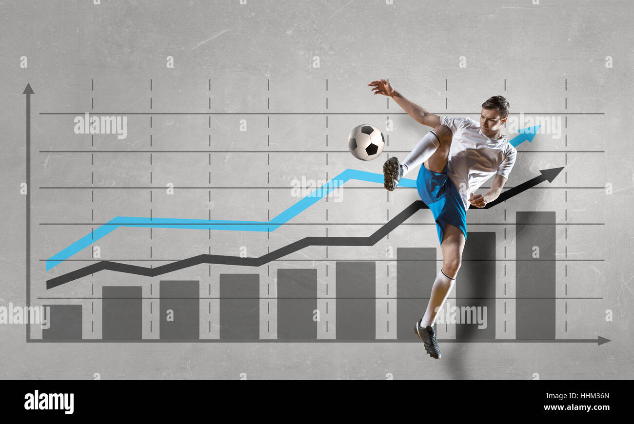 Football player kicking ball and graphs at background. Mixed media ...
