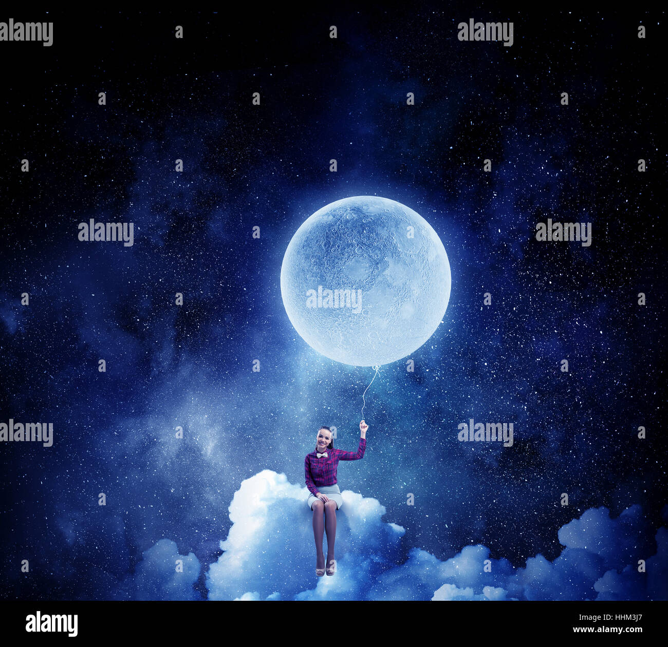 Silhouette of woman against starry sky catching moon Stock Photo - Alamy