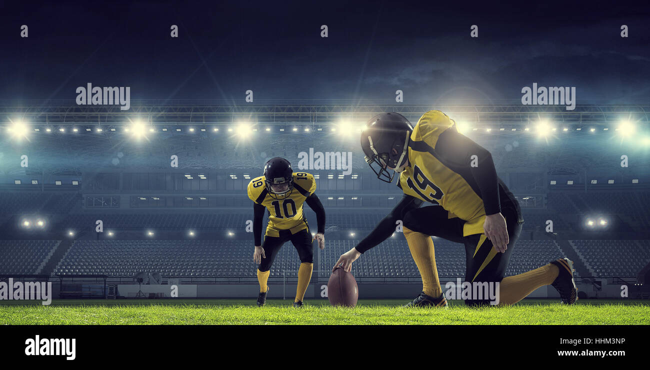 Two american football players fight hi-res stock photography and images ...