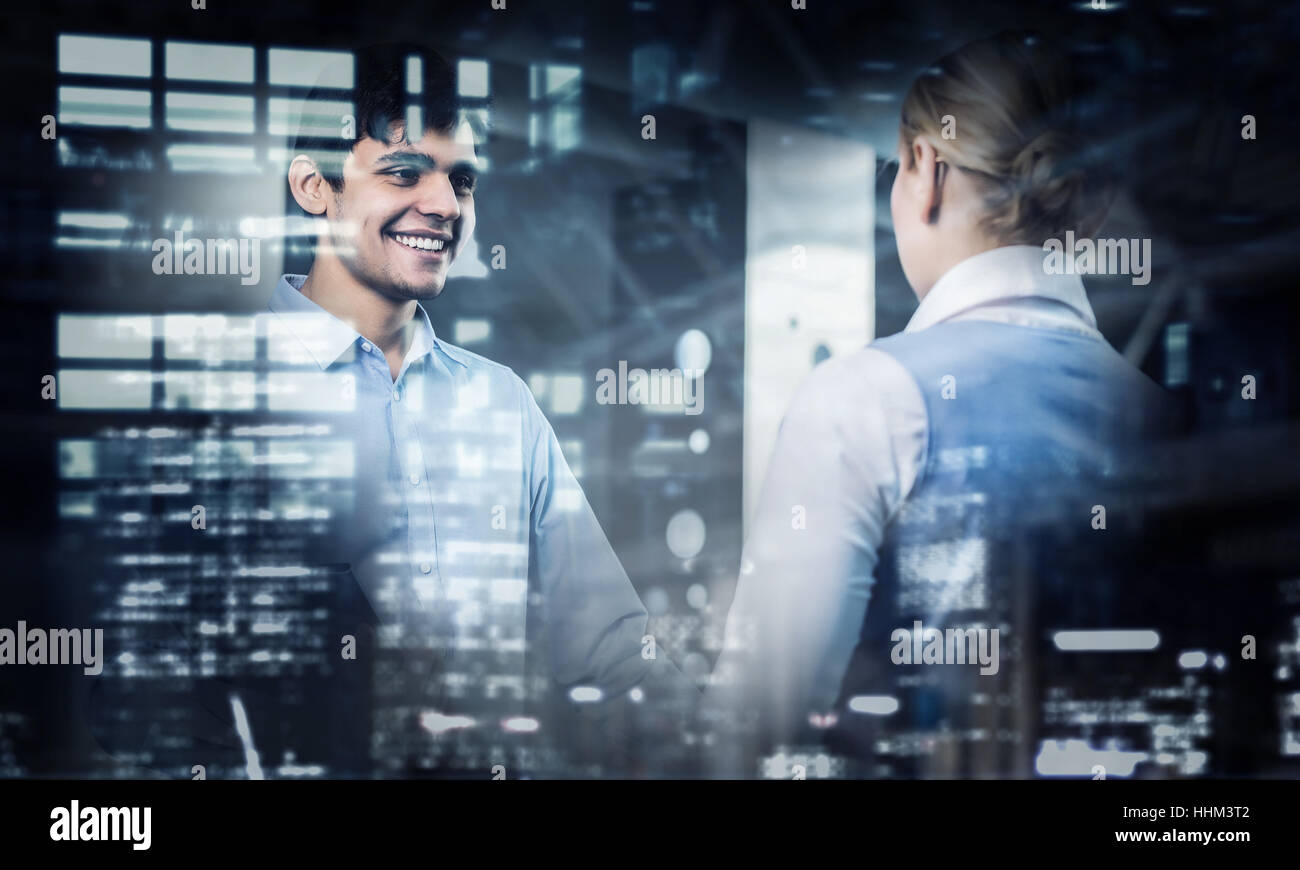 Double exposure image of business partners and city Stock Photo - Alamy