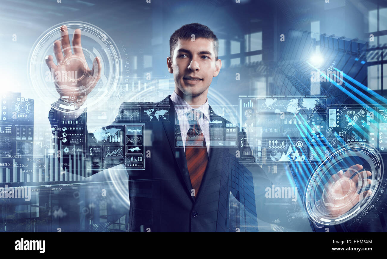 Young handsome businessman working with virtual interface panel . Mixed ...