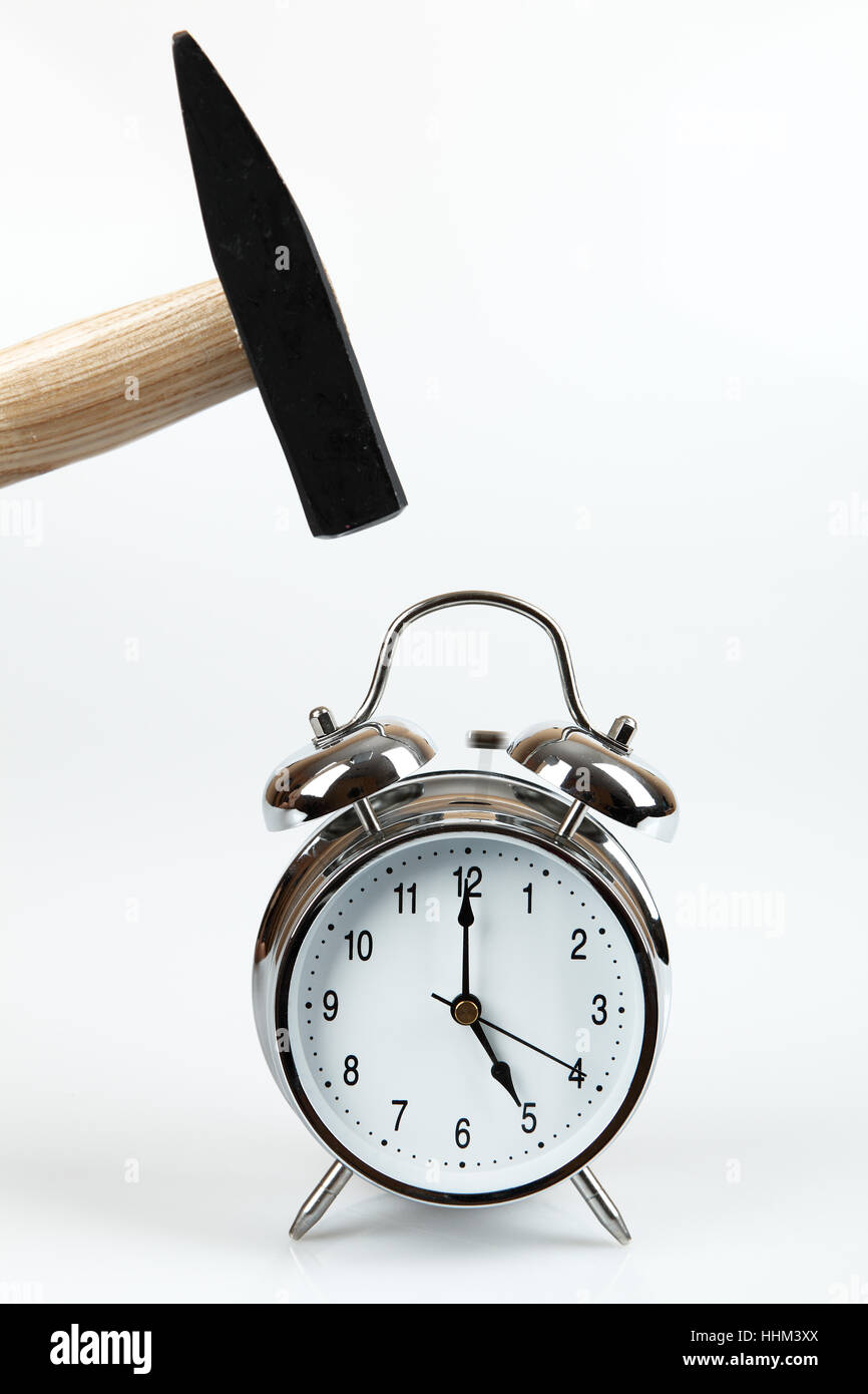 alarm clock with hammer Stock Photo - Alamy
