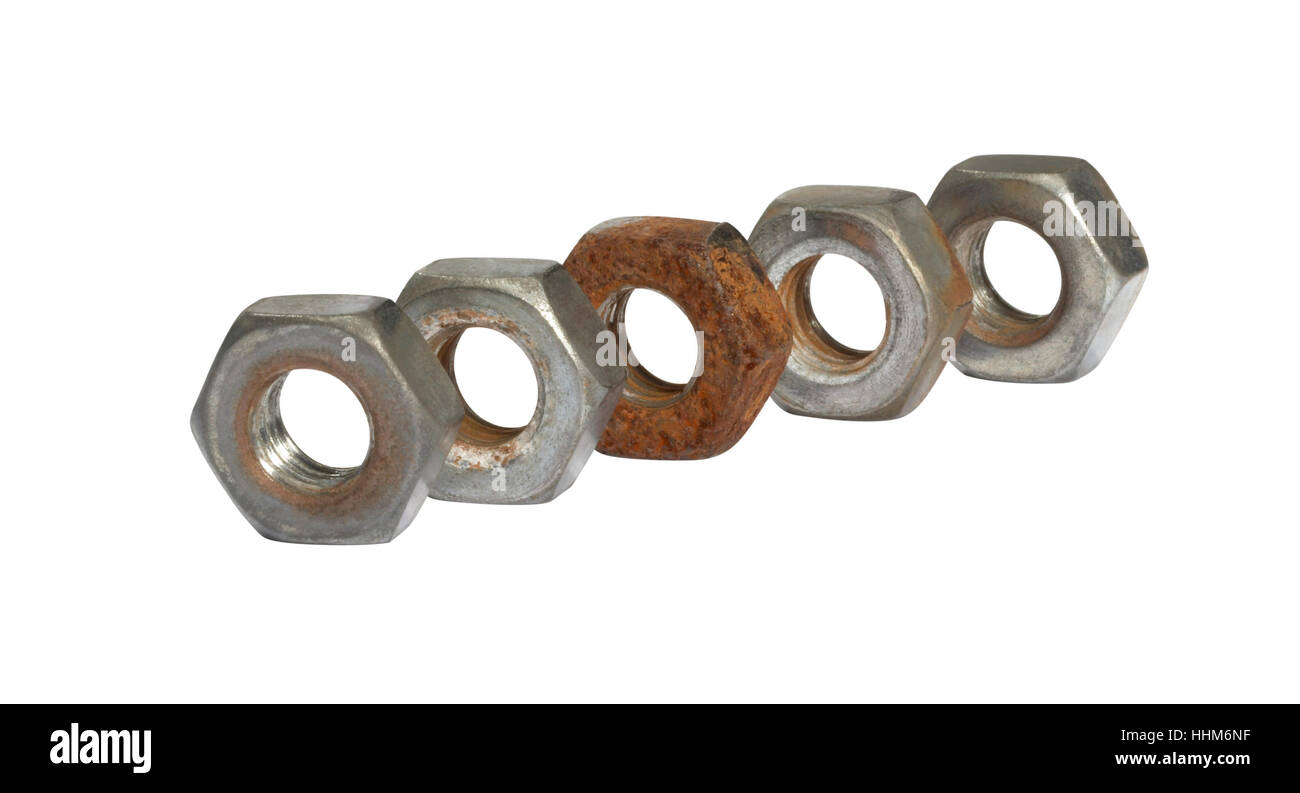 studio photography of old corroded screw nuts in a row isolated on ...