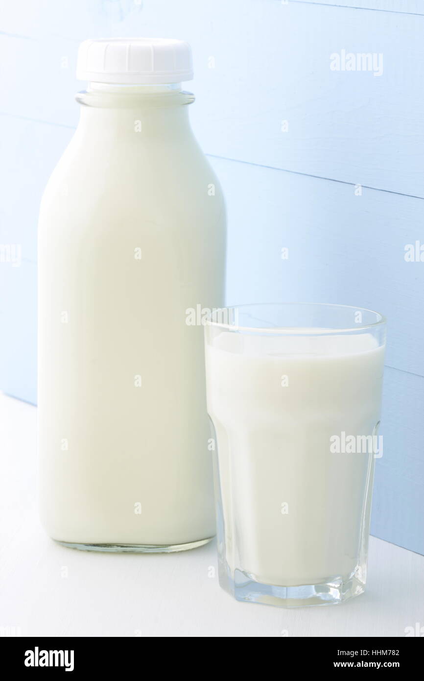 Delicious, nutritious and fresh Quart Milk Bottle Stock Photo - Alamy