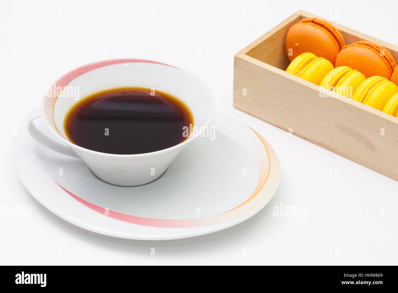 Coffee break - Cup of coffee and traditional french colorful macarons ...
