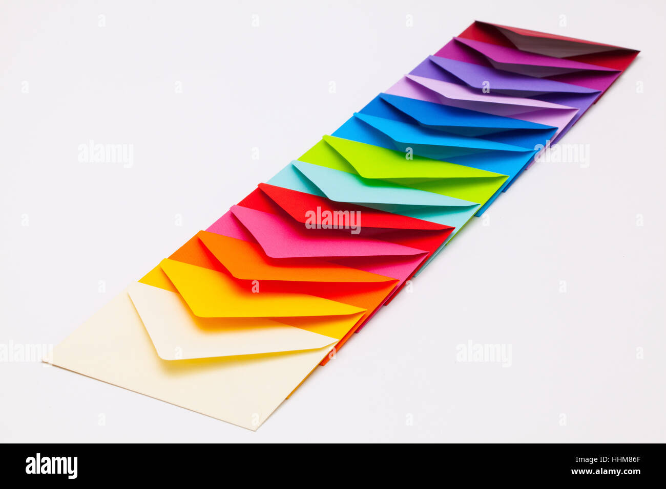 Different colored envelopes on the white background Stock Photo - Alamy