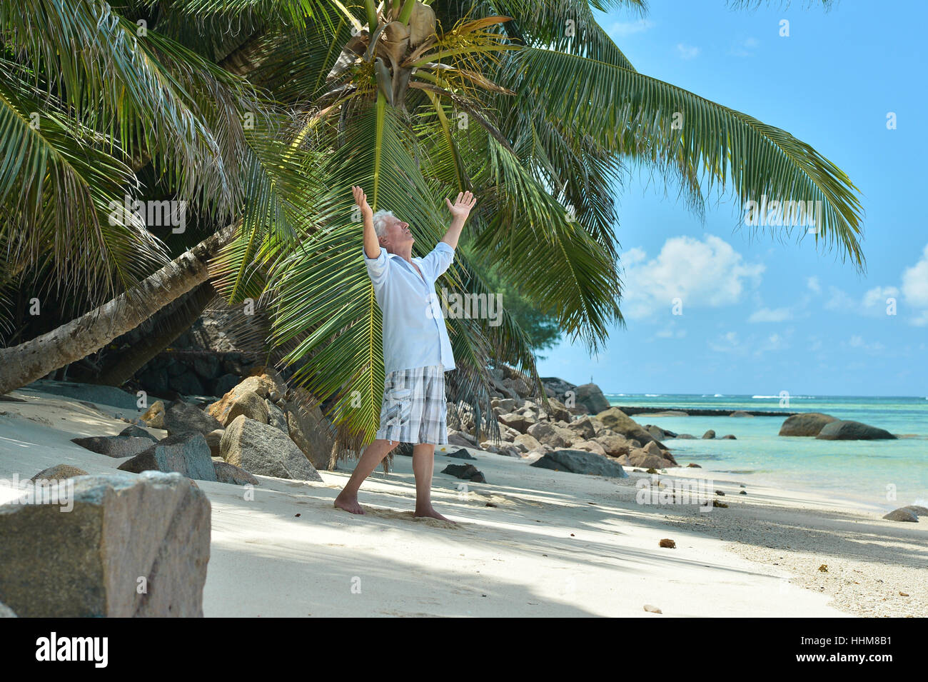 mature man on tropical island Stock Photo - Alamy