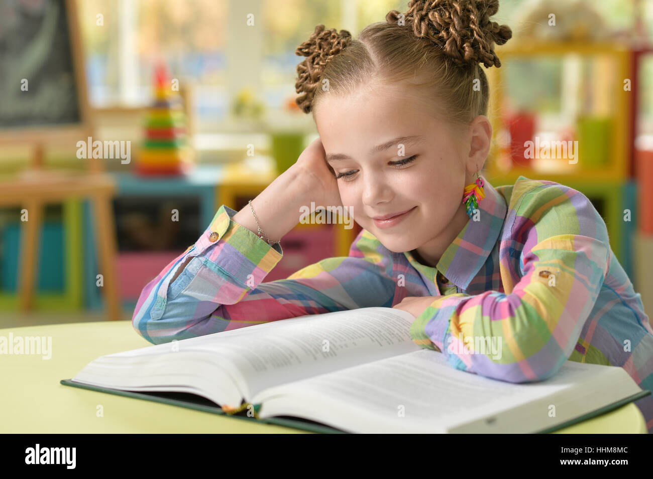 little girl doing homework Stock Photo - Alamy