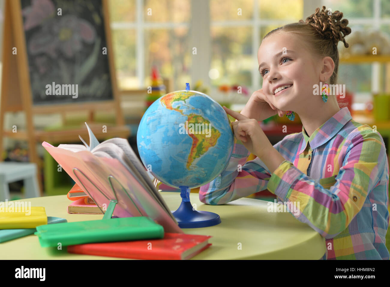 little girl doing homework Stock Photo - Alamy