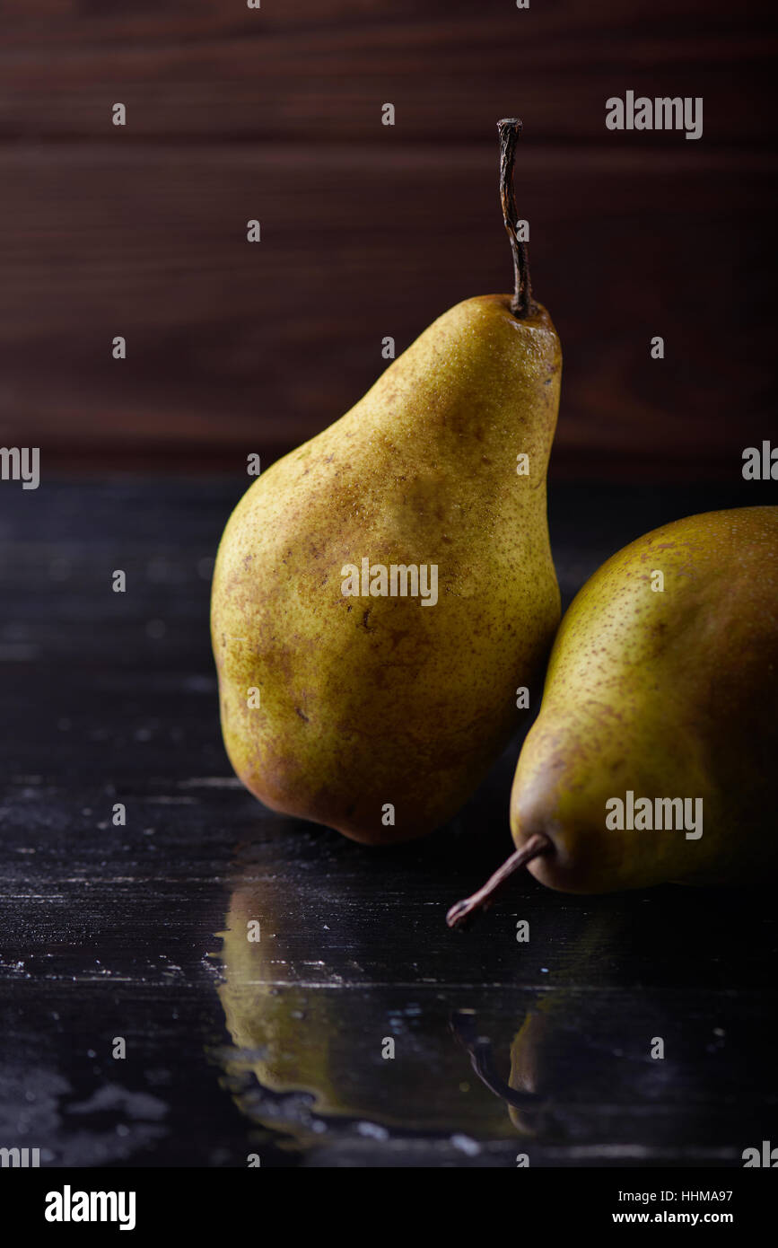 Pear on rustic wood hi-res stock photography and images - Alamy