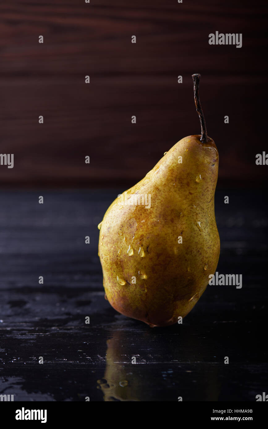 Pear on rustic wood hi-res stock photography and images - Alamy
