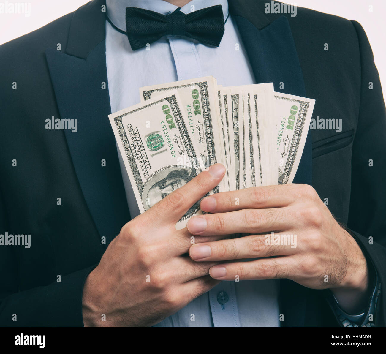 close up of businessman with money. US currency in a hands Stock Photo ...