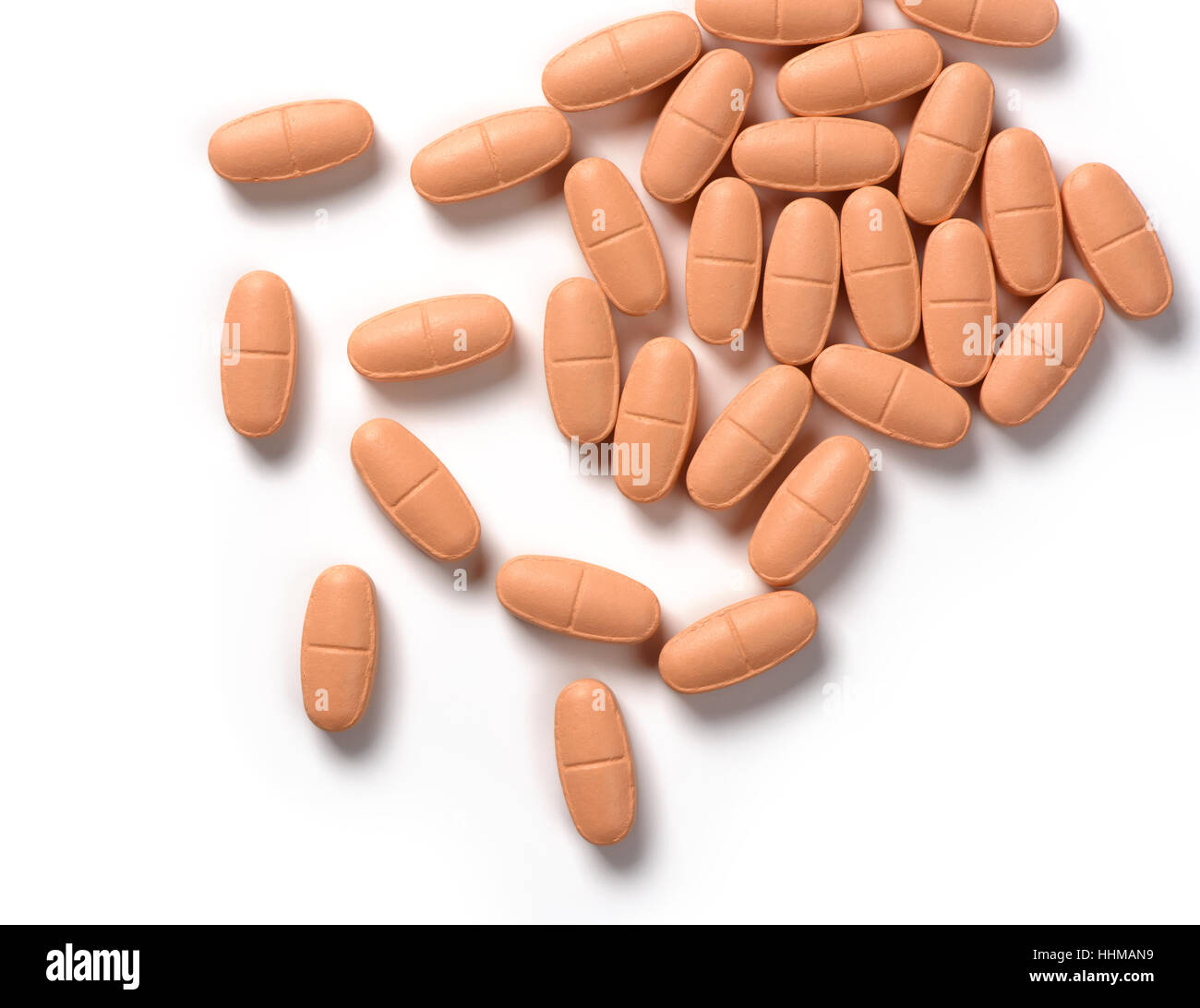 orange Supplements isolated on white background. Pills top view Stock ...