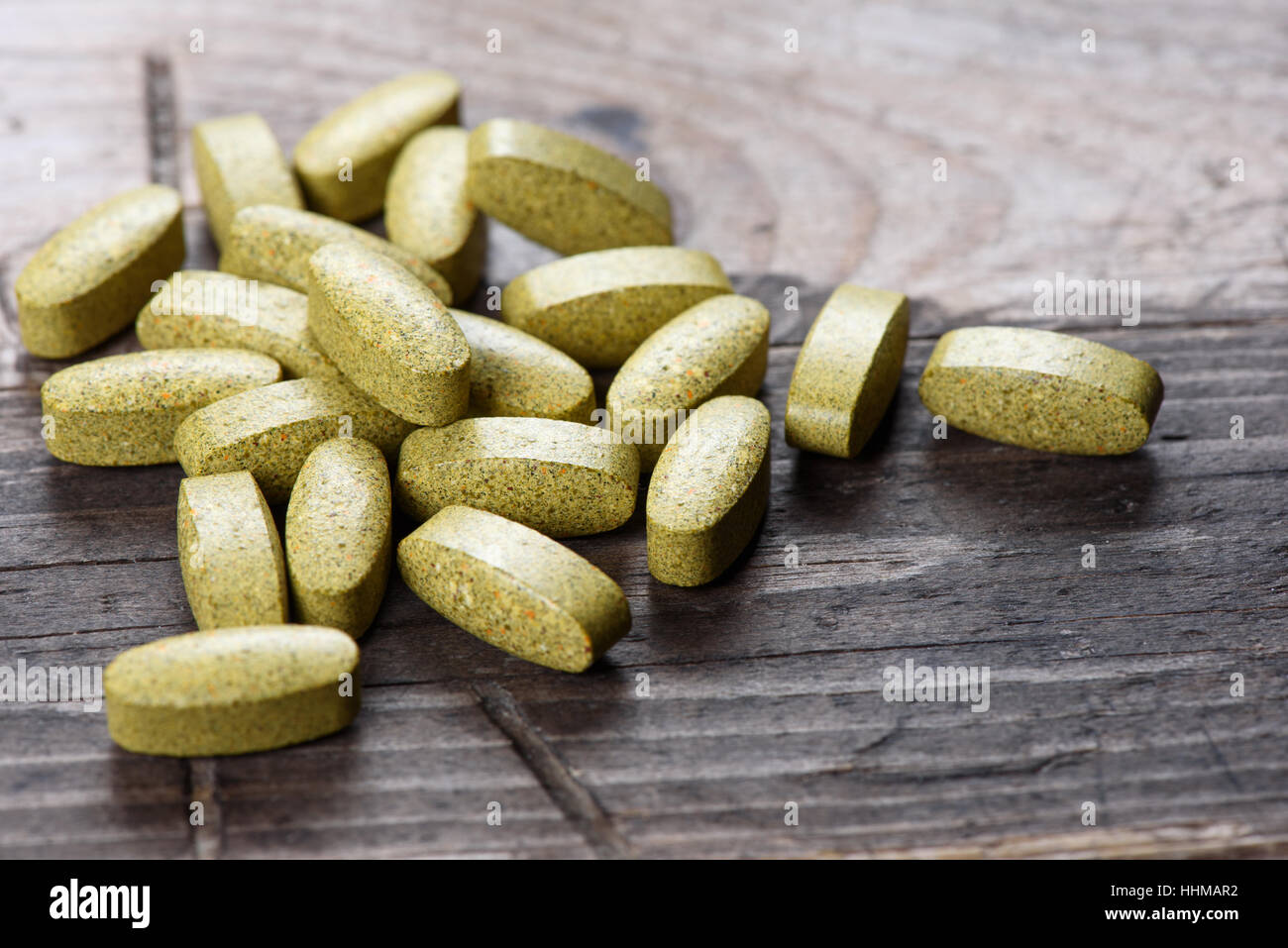 Green vitamin supplement tablet hi-res stock photography and images - Alamy