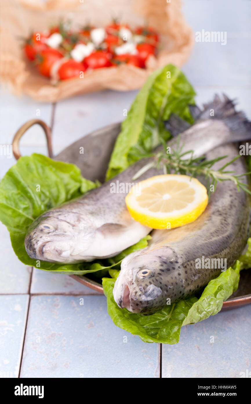prepare fresh fish in the kitchen Stock Photo - Alamy