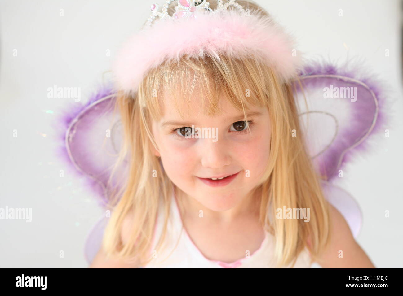 Sweet little blonde Child dressed as a fairy smiling, Pretty angel ...