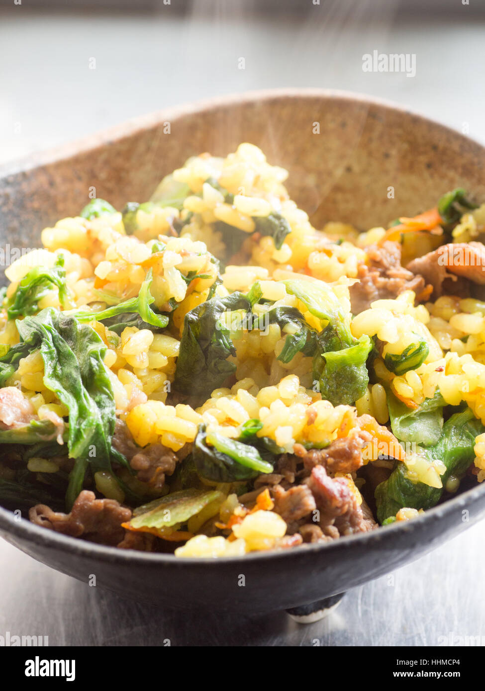 Japanese cuisine, lettuce and beef fried rice in the bowl Stock Photo ...