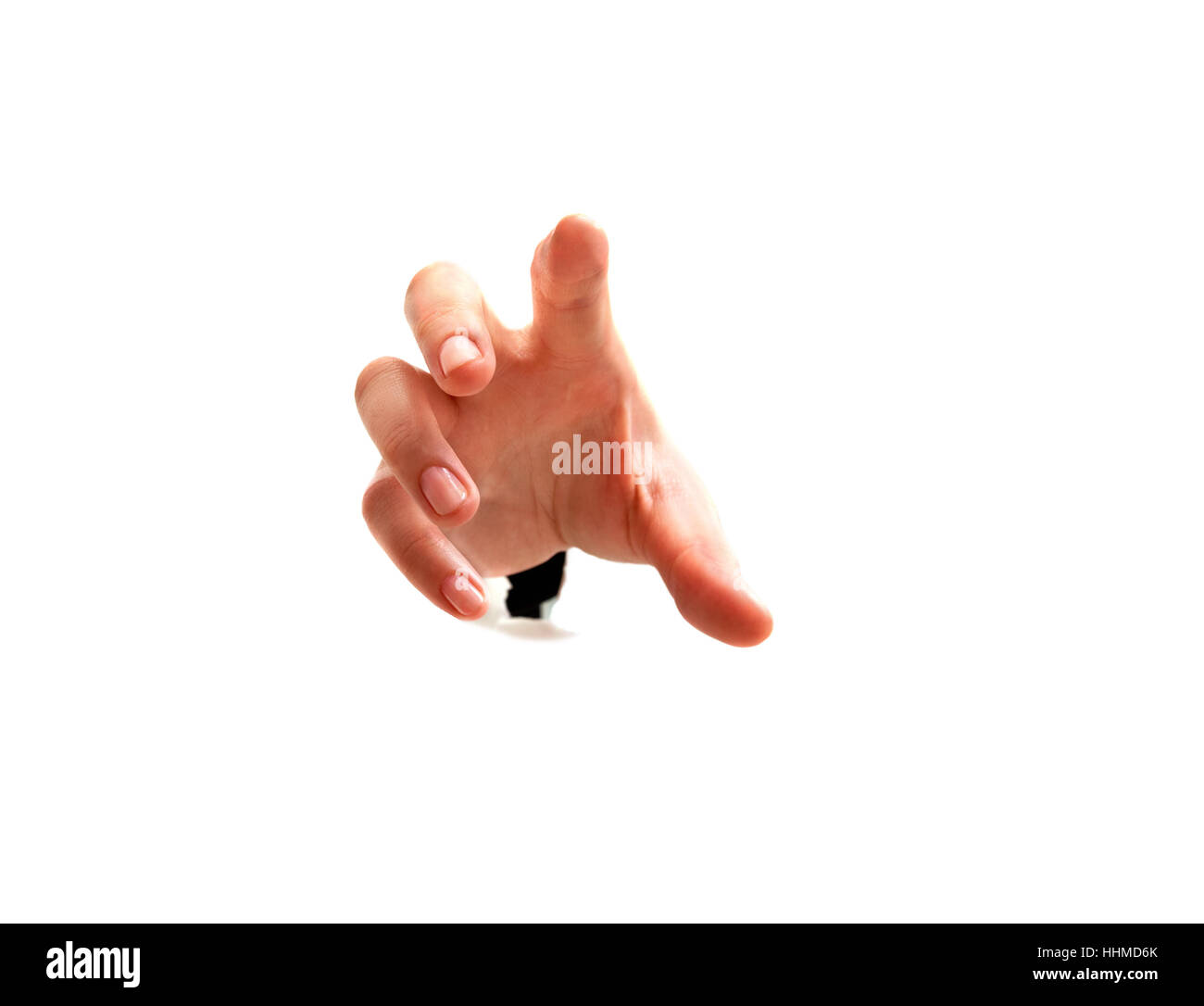 Image of human hand reaching out through torn paper Stock Photo - Alamy