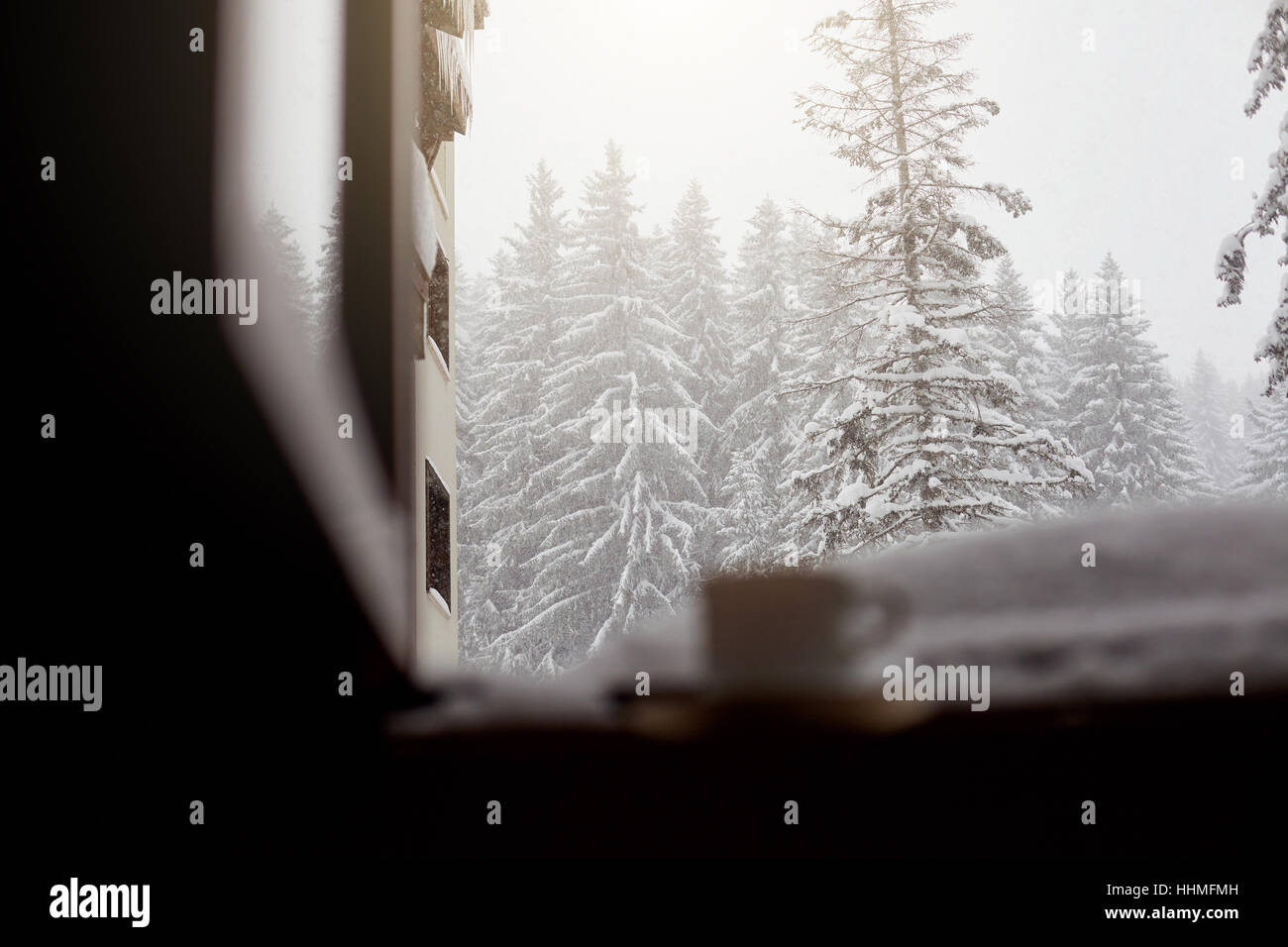 Mug with tea and coffee on the window sill snow in winter w Stock Photo ...