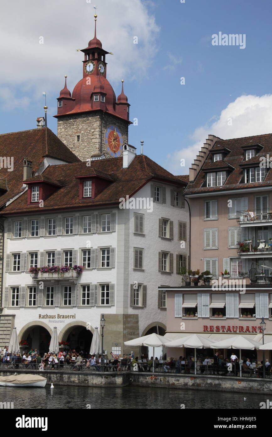 Historic clock tower of the town hall of Lucerne from the Chapel Bridge ...