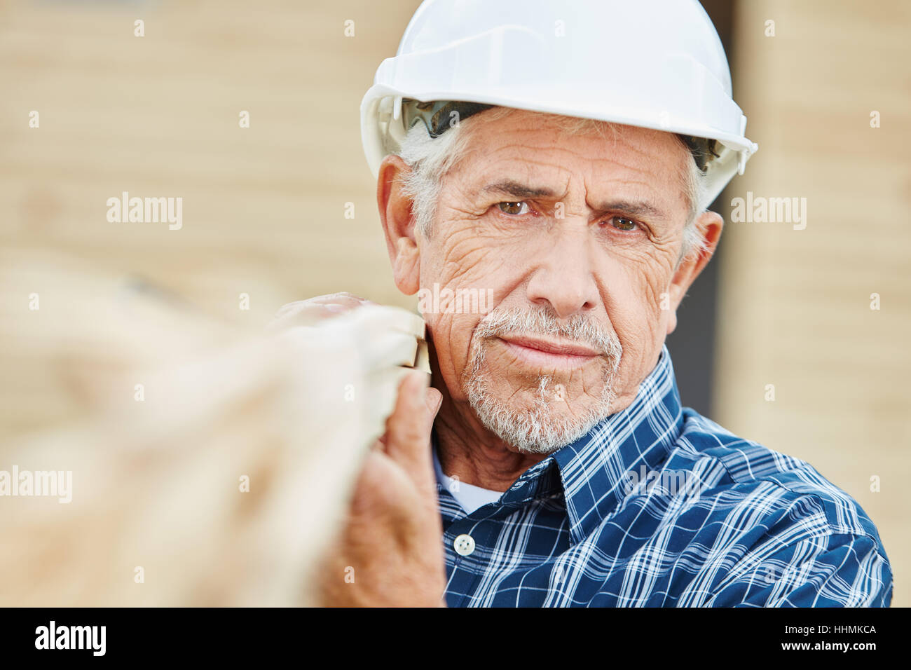 Senior as old craftsman with experience Stock Photo - Alamy