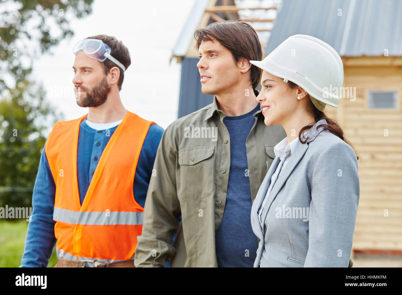 Building construction team standing proud at construction site Stock ...
