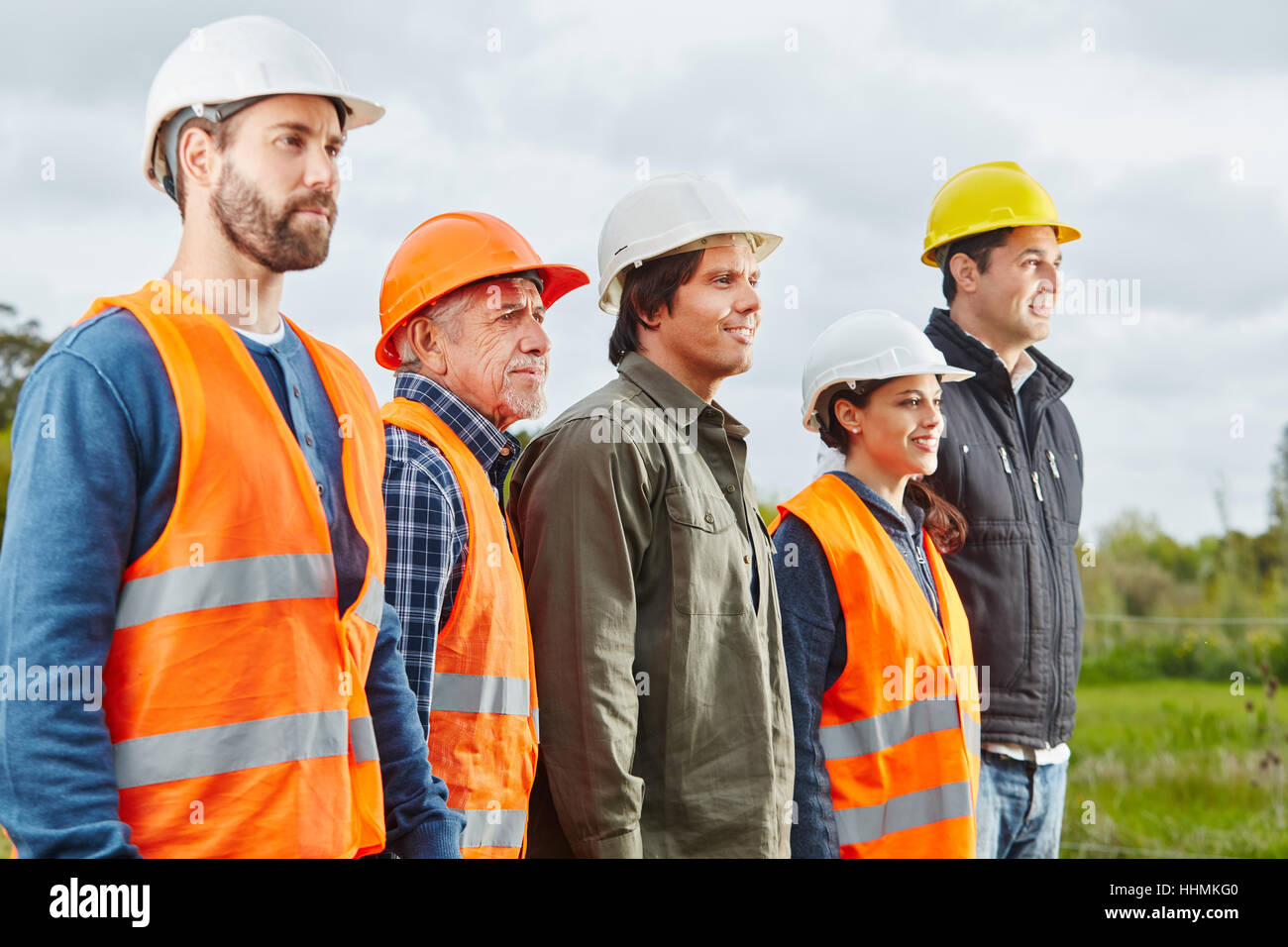 Group of construction workers standing proud and self confident Stock ...