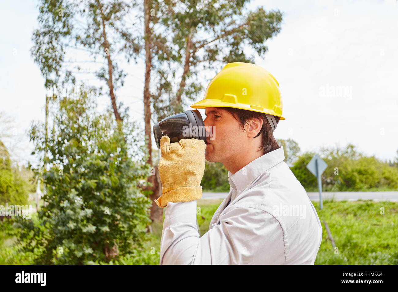 Construction drinking coffee construction site hi-res stock photography ...