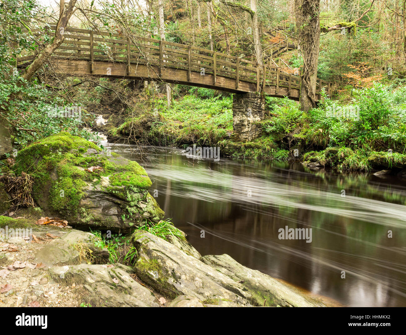 River Under Footbridge Stock Photo - Alamy