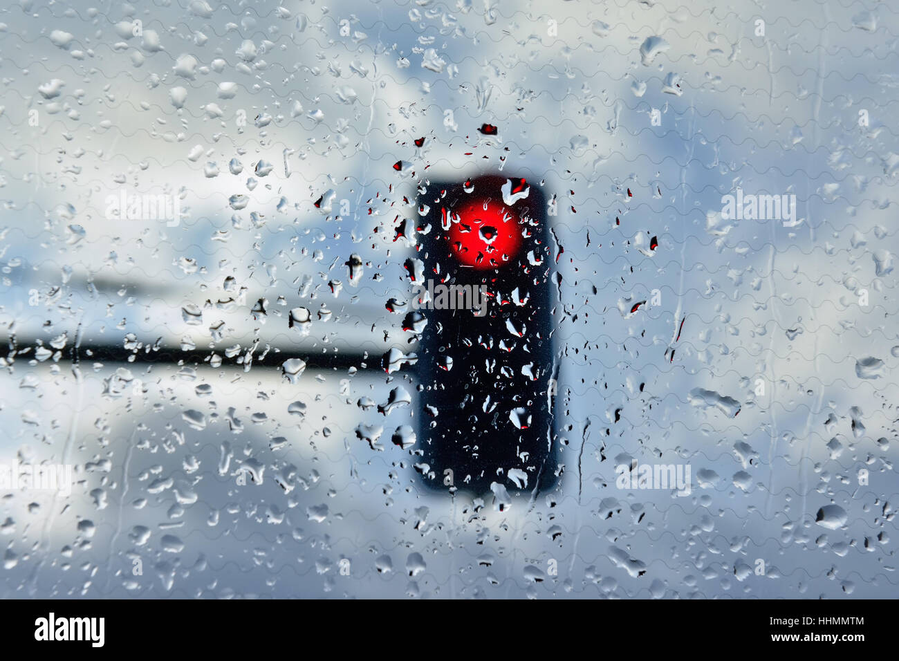 Traffic lights behind car window in rainy day Stock Photo - Alamy