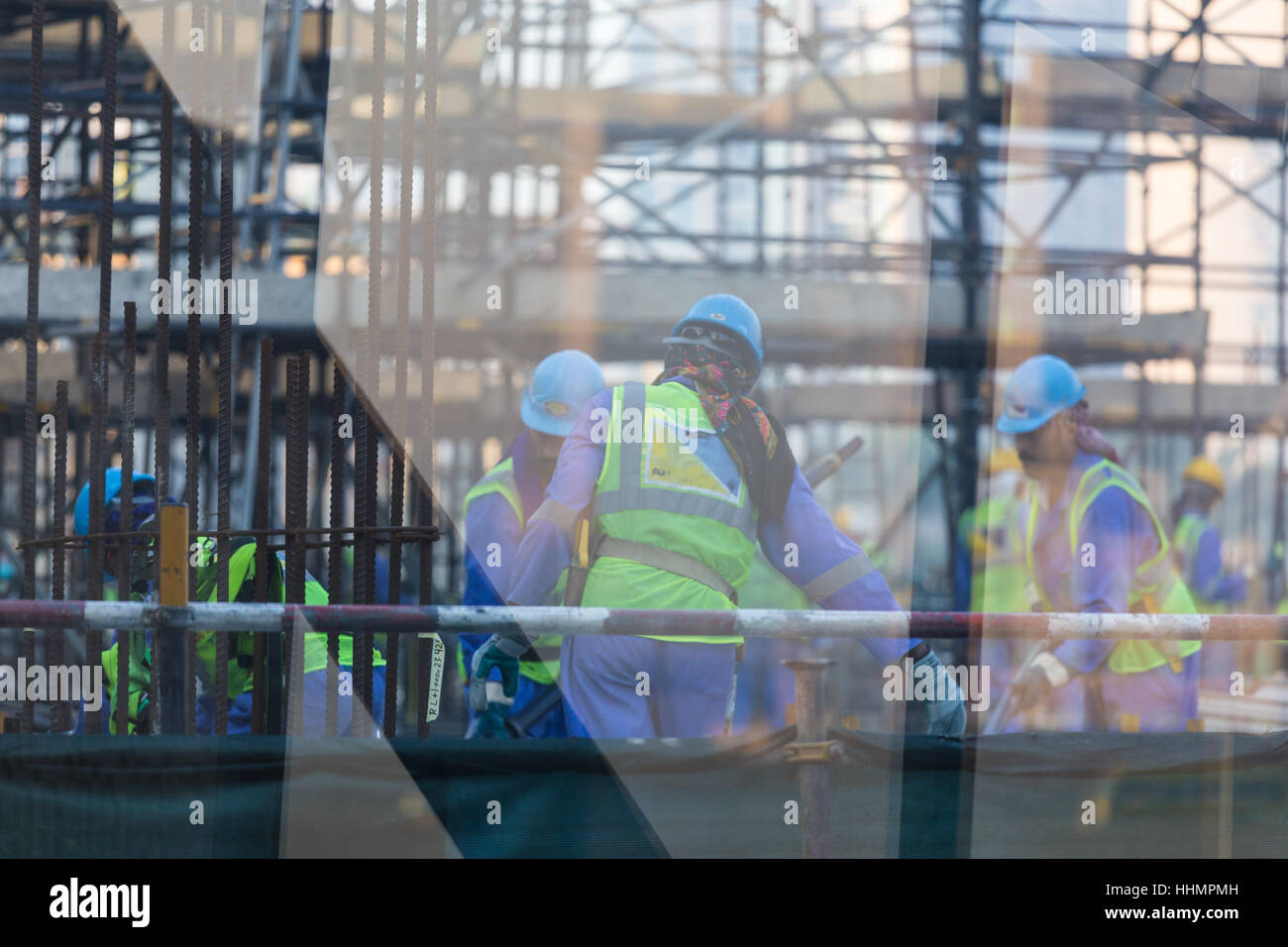 Team of construction worker on construction site Stock Photo - Alamy