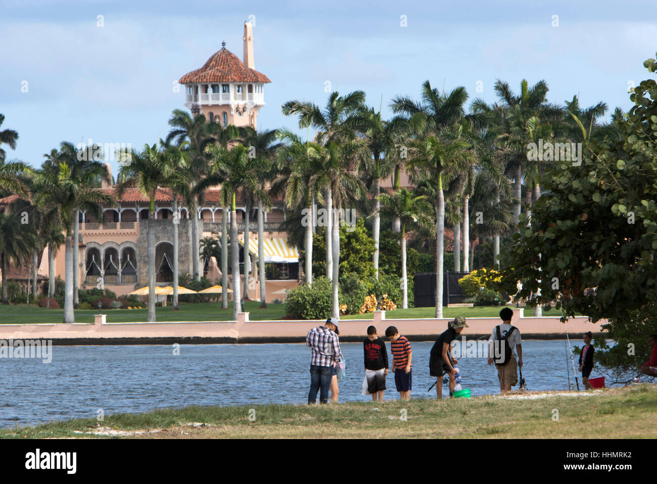 Fishermen along the intracoastal waterway behind President Donald Trump ...