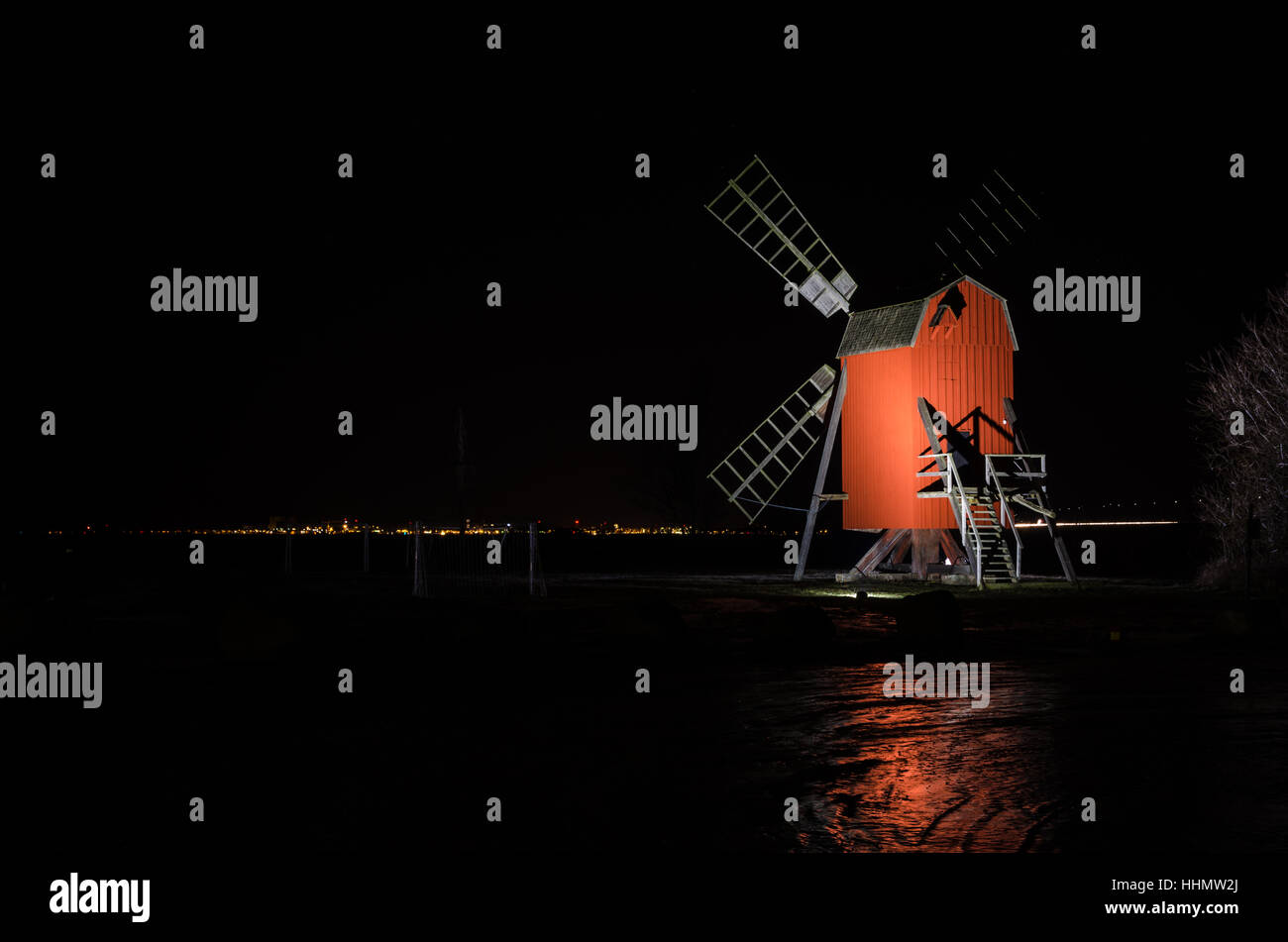 Red old traditional wooden windmill by night - an iconic symbol for the ...
