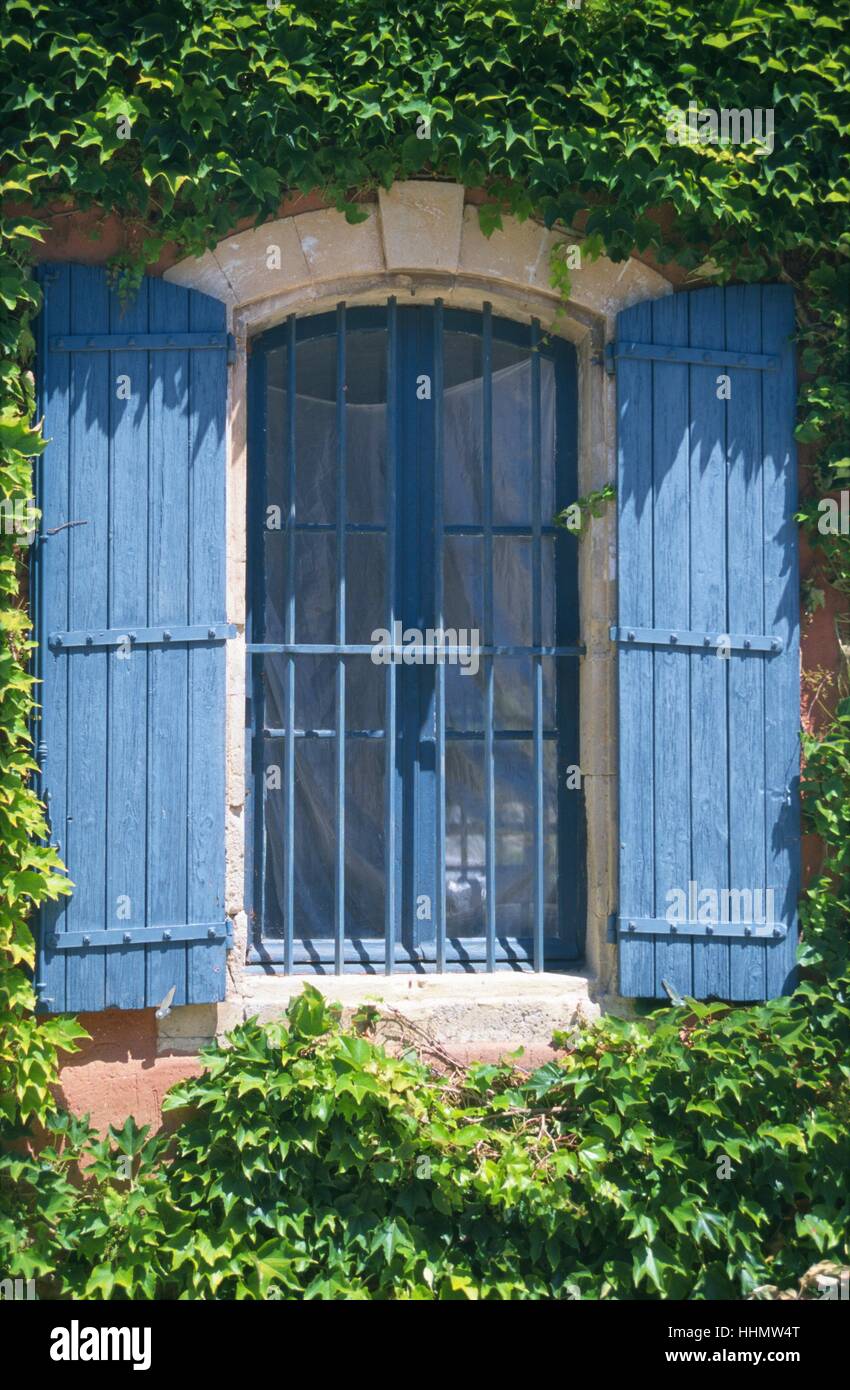 Window with blue shutters, Provence, France Stock Photo - Alamy