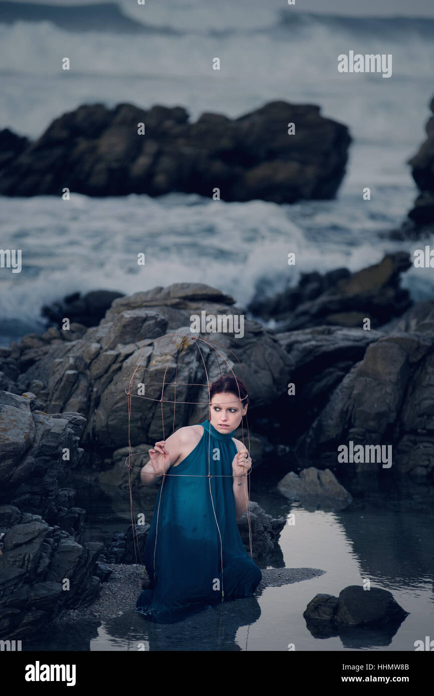 Woman in a cage hi-res stock photography and images - Alamy