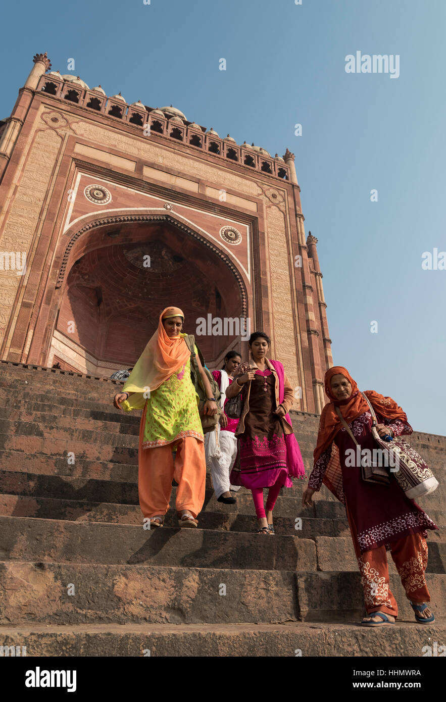 Indian women descending stairs from Buland Darwaza, Gate of ...