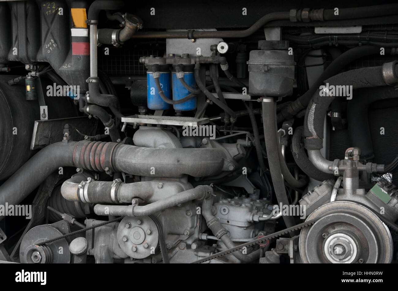 Dirty engine of a bus Stock Photo - Alamy