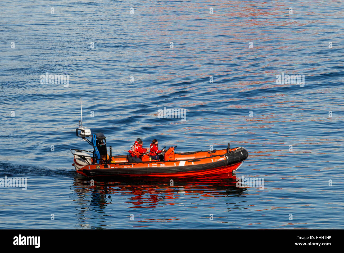 Canada Coast Guard RIB Zodiac with crew on patrol in Vancouver Harbour ...