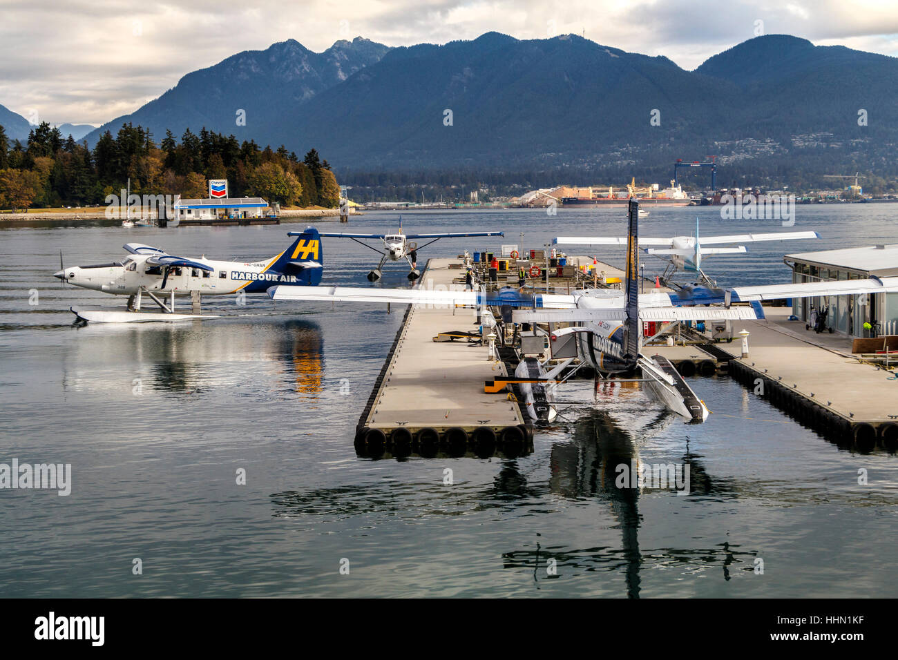 Harbour Air seaplanes moored at the Vancouver Harbour Flight Centre ...