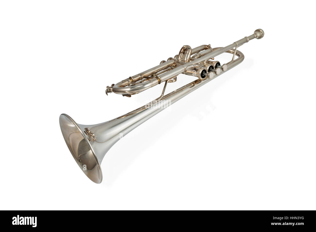 Wind Instrument - laying brass trumpet isolated on white background ...