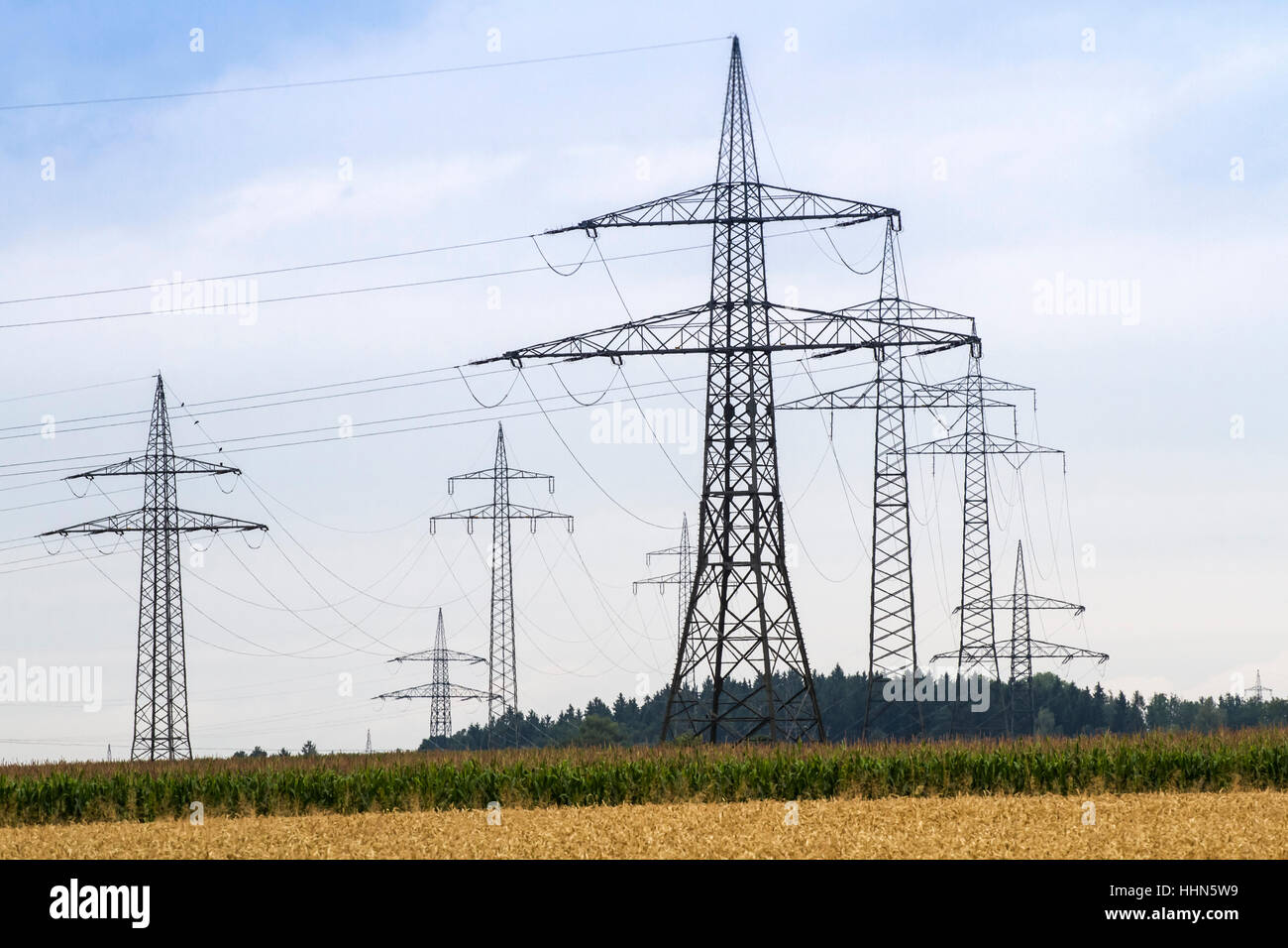 pylons in a field Stock Photo - Alamy