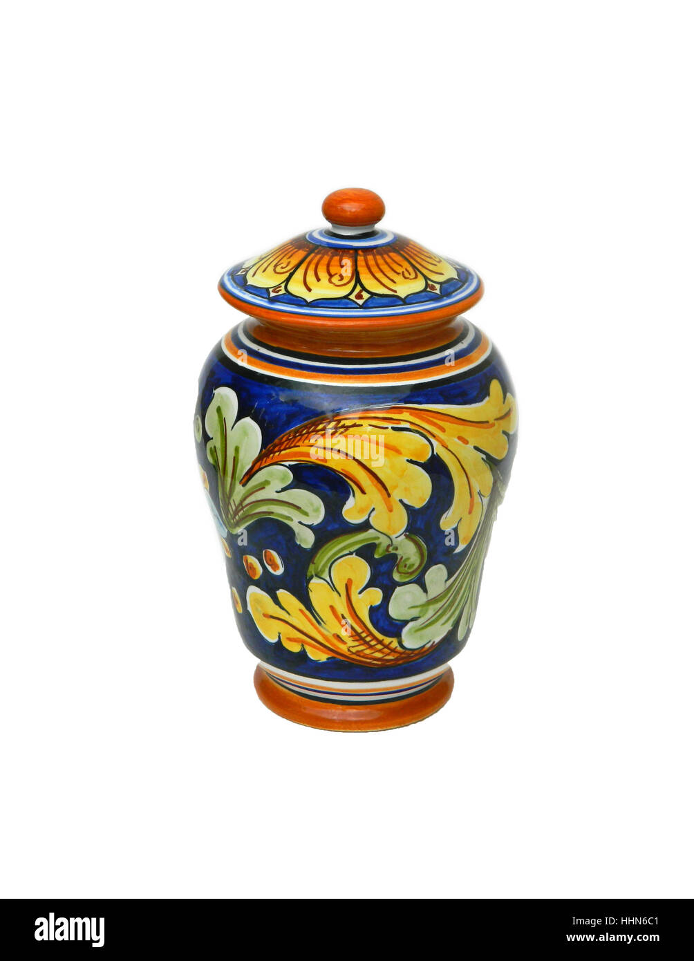 This is a photo of a ceramic jar standing upright with a white ...