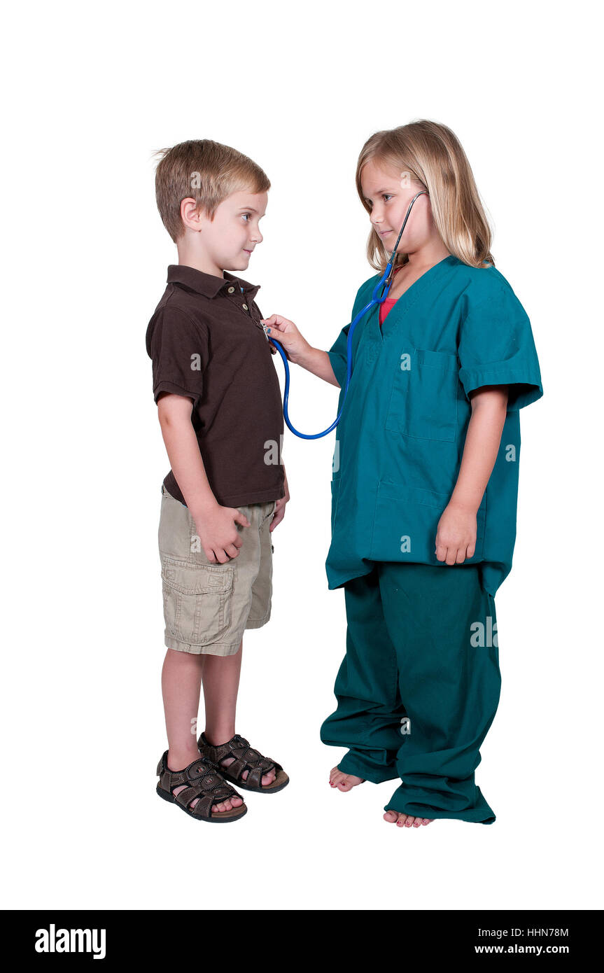 Kids Playing Doctor And Patient Cut Out Stock Images & Pictures - Alamy