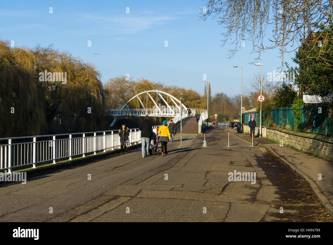 People walking on winters day Riverside Cambridge Cambridgeshire 2017 ...
