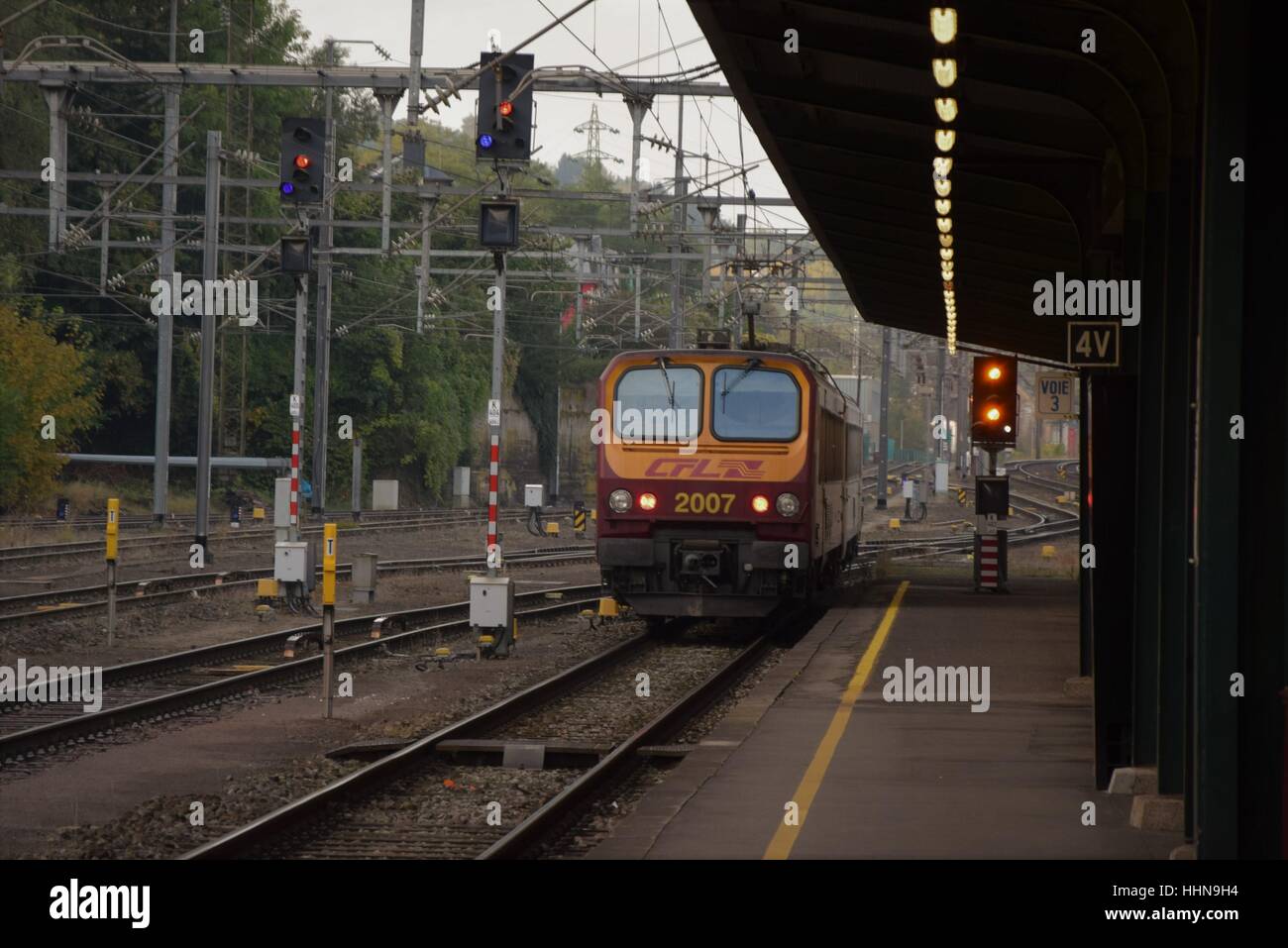 Train arriving the station Stock Photo - Alamy