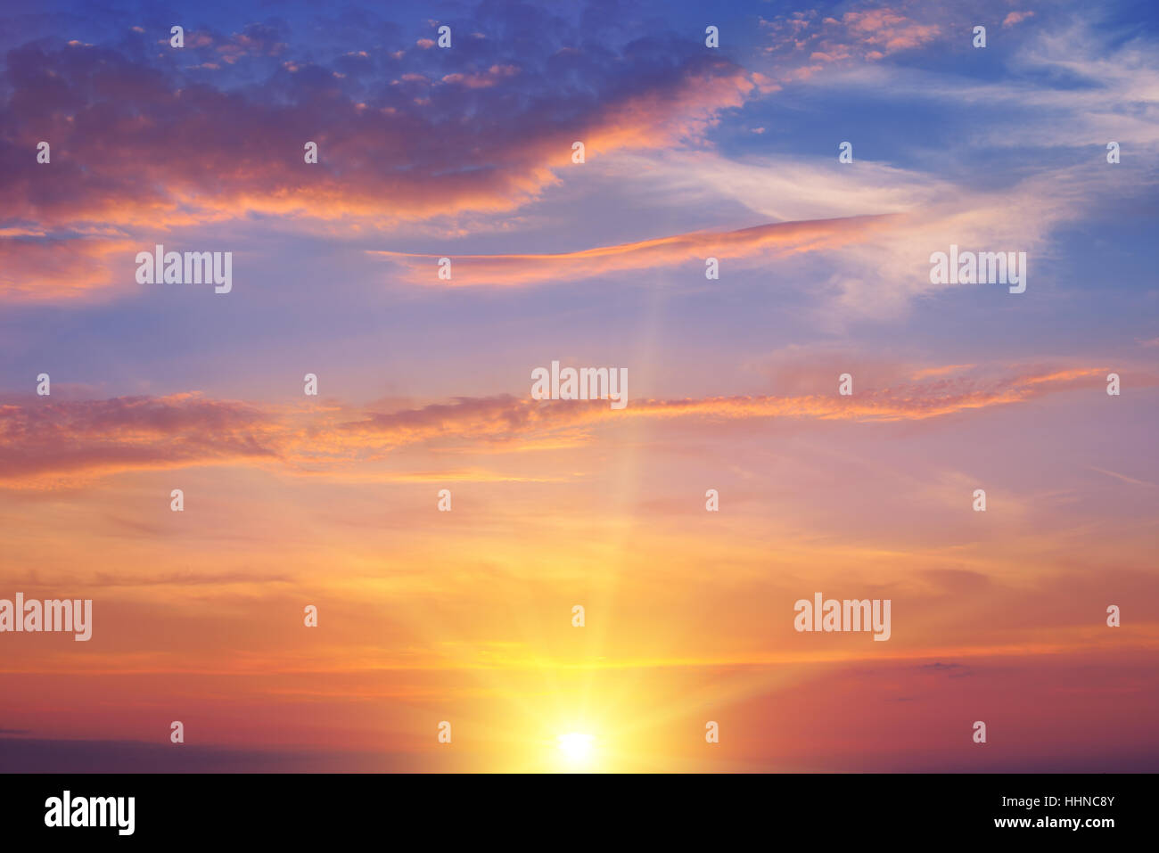 the sun rays illuminate the sky above the horizon Stock Photo - Alamy