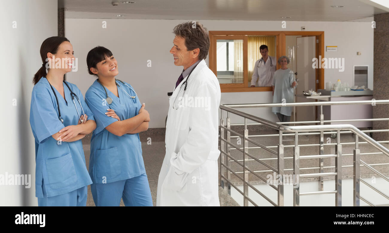 Nurses standing in hospital hallway hi-res stock photography and images ...